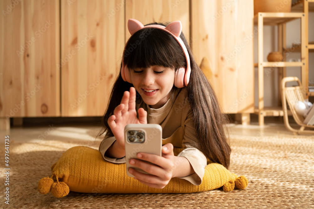 Cute girl making video call Stock Photo | Adobe Stock