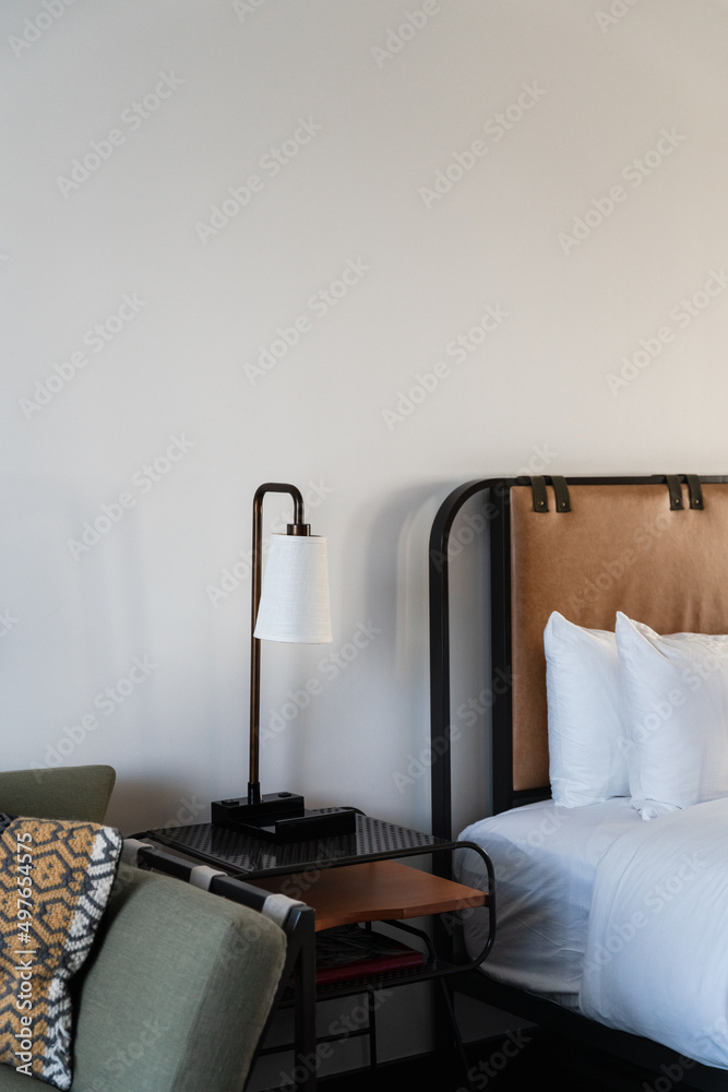 Vignette of Bed with Sofa and Bedside Table Stock Photo | Adobe Stock