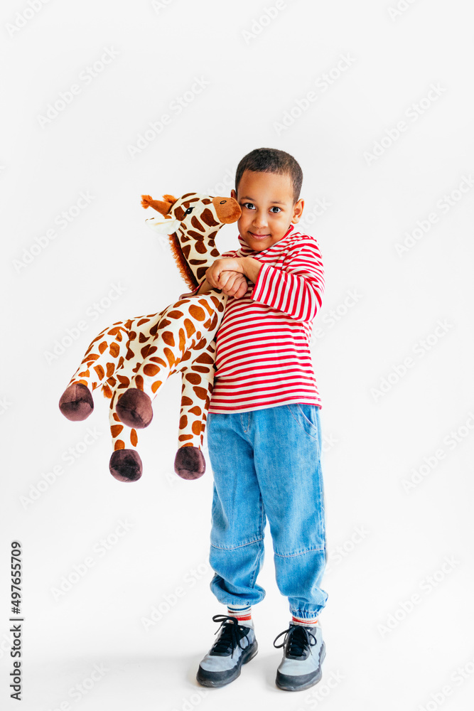 Boy and Giraffe Stock Photo | Adobe Stock