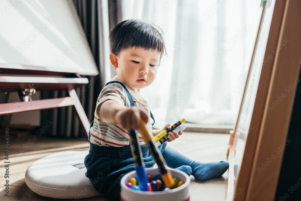 Asian little baby boy drawing Stock Photo | Adobe Stock