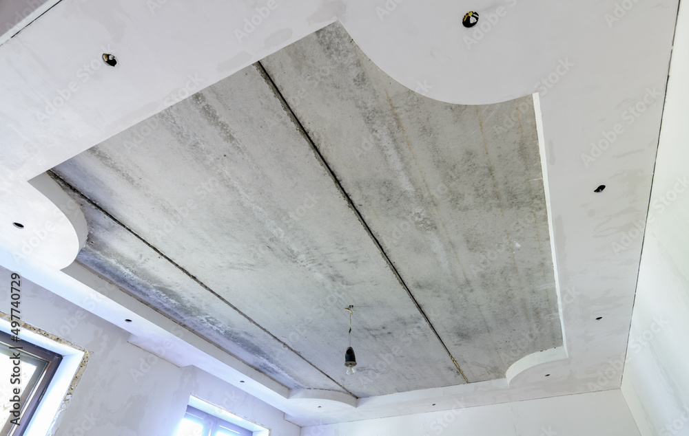 Installation of a two-level ceiling with lighting, floors of reinforced ...