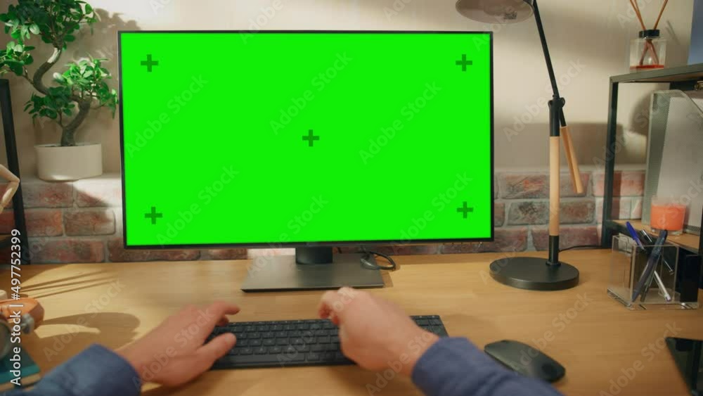 POV First Person View of a Man Working on Desktop Computer with Green ...