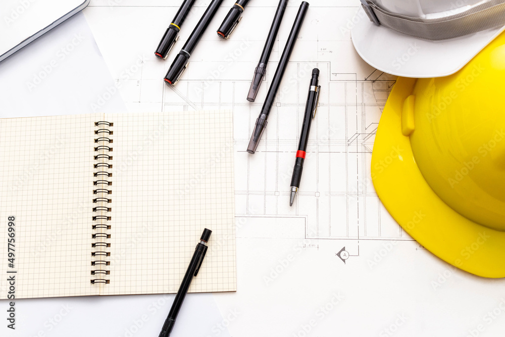Mockup of architectural concept, Drawing tools and safety helmet on ...