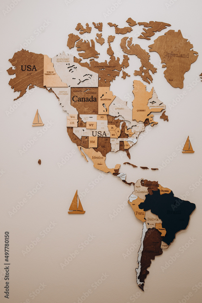 Wooden world map on a white background. Handmade. Plywood. In brown ...
