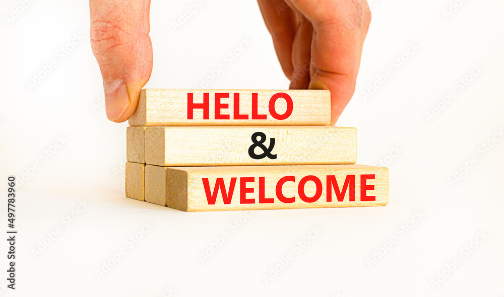 Hello and welcome symbol. Concept words Hello and welcome on wooden ...
