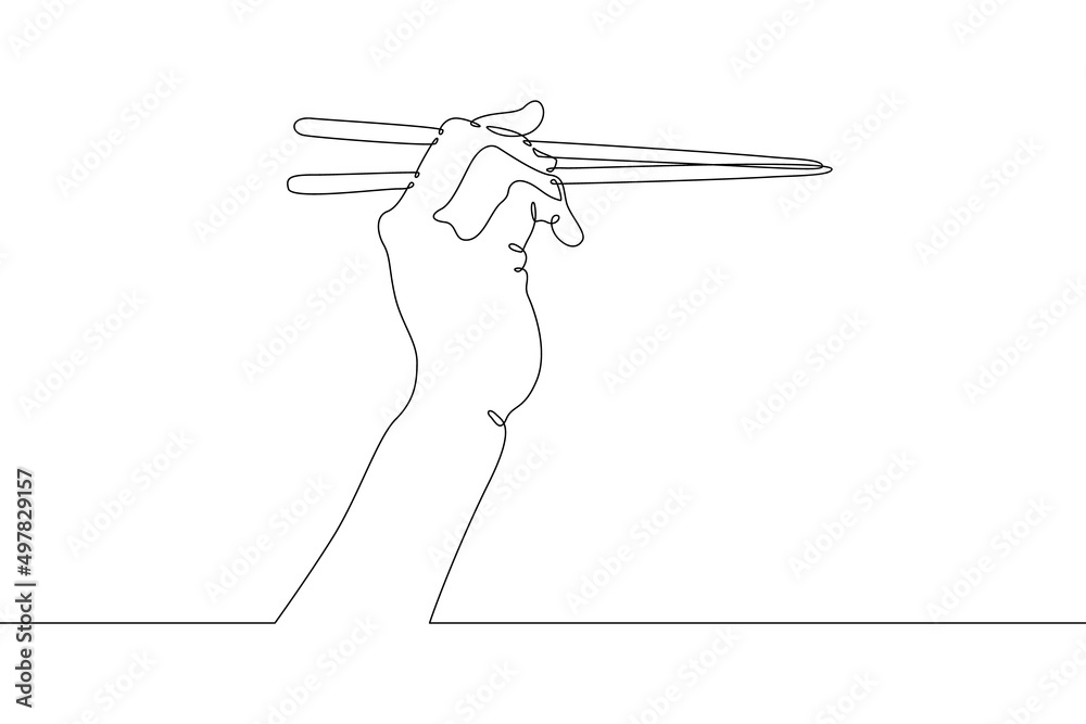 The hand holds chopsticks. Asian traditional cutlery.One continuous ...