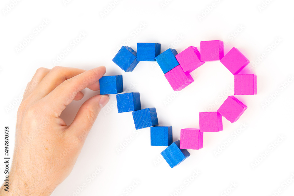 Building a heart symbol from wooden blocks on white Stock Photo | Adobe ...