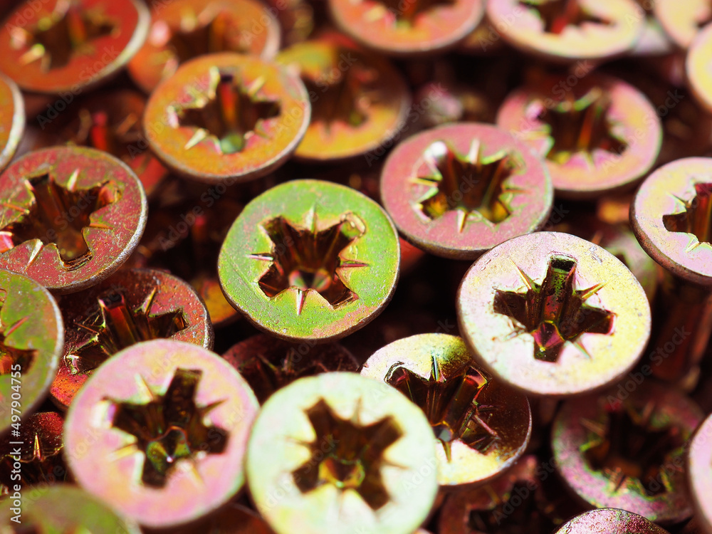 Foto de Anodized screw caps close-up. A vivid illustration on the theme ...