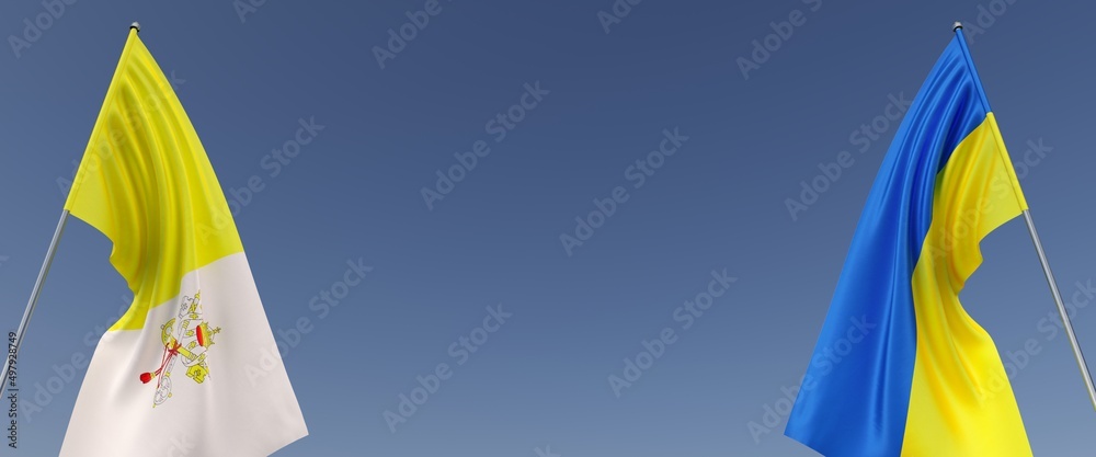 Flags of Ukraine and the Vatican on flagpoles on sides on a blue ...