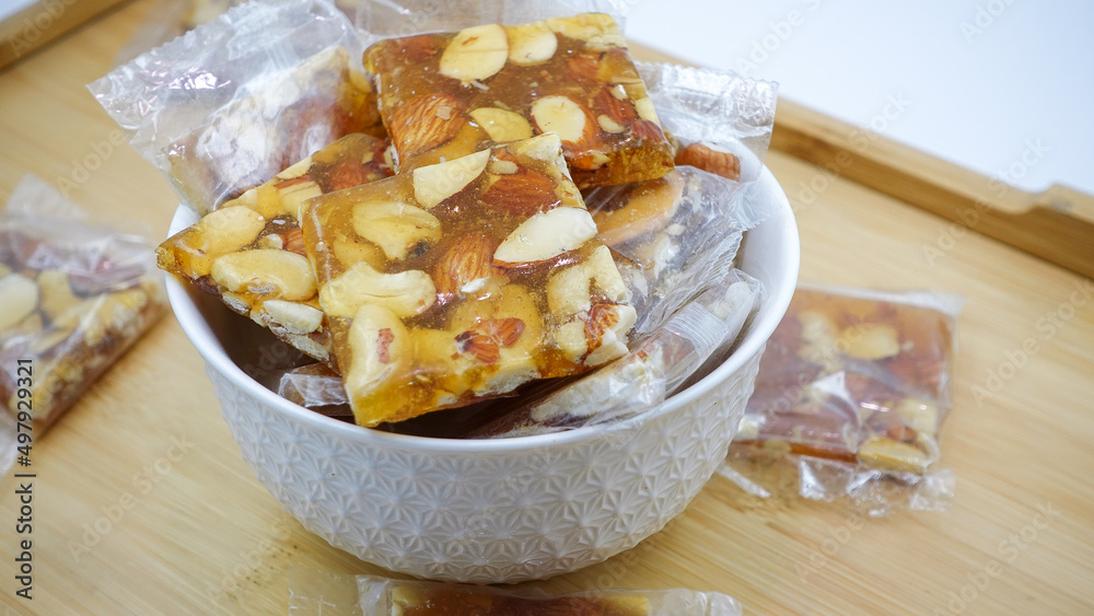 Peanut Chikki. Tasty peanuts chiki. Popular Indian festive sweet from ...