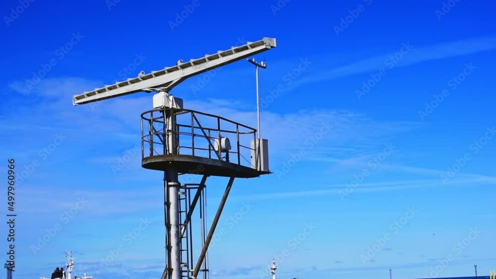Marine radar tower, rotating antenna. Sea radar in the port of ...