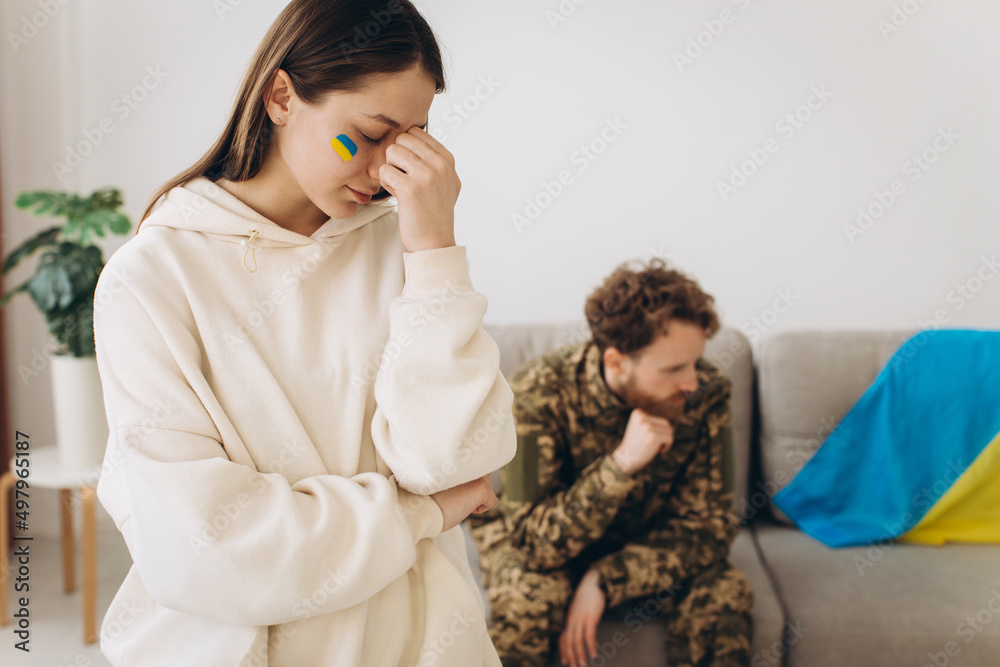 A Ukrainian woman mourns and says goodbye to her military husband in a ...