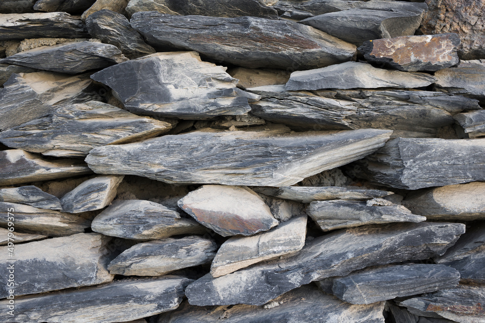 Grey bricks slate texture background . Vintage stone wall texture close ...