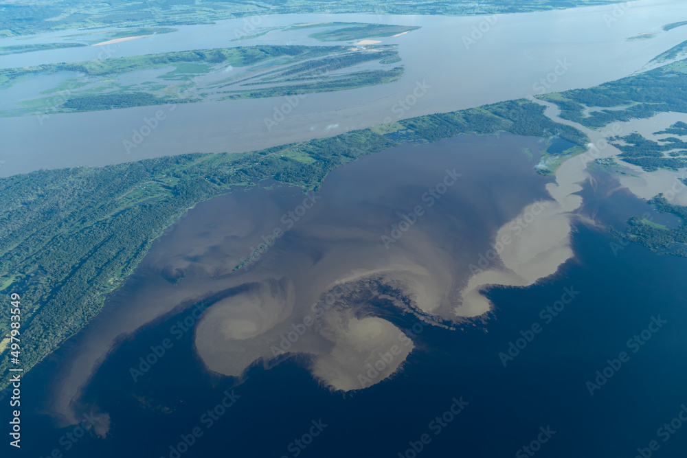 Aerial photo of the Amazon rainforest and the Amazon River basin in ...