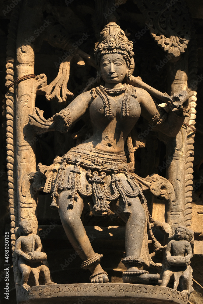 Stone Sculpture of Beautiful Female (Madanikas) with selective focus ...