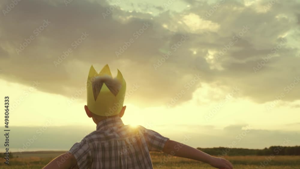 child runs fast sunset. boy son dreams superhero fly. runner little kid ...