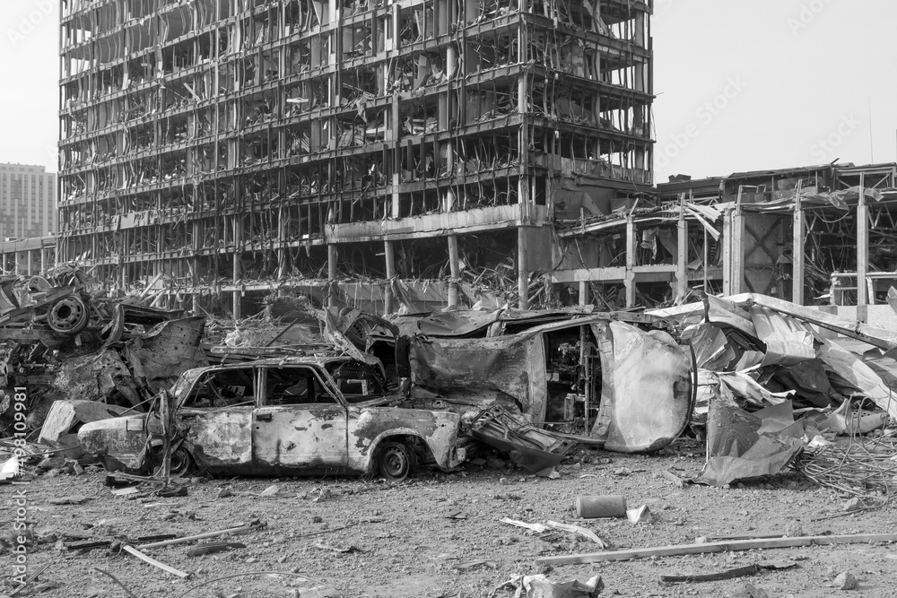 Aftermath shell of civilian bombed city damage car. 2022 Russian ...