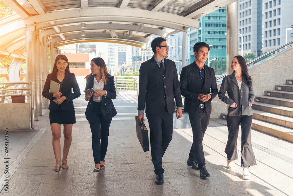 Crowd business people walking go to work in modern city life to working ...