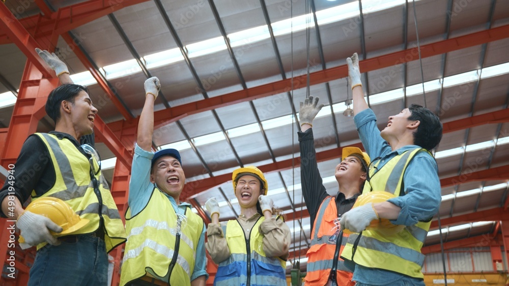 Factory Workers join stacking hand together for collaboration in Metal ...
