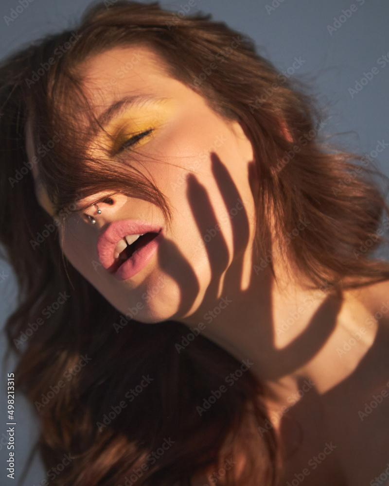 Portrait of a beautiful asian girl with short black hair covering her ...