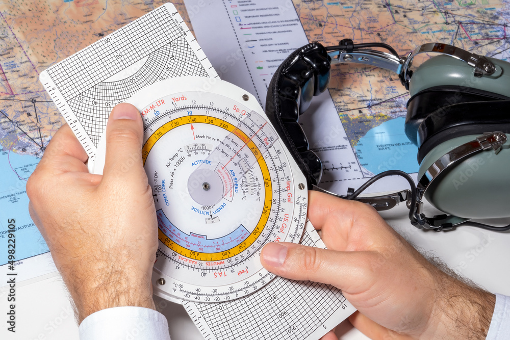 The pilot plans a flight, calculates the altitude, speed, fuel ...