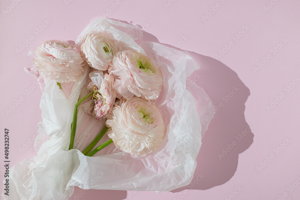 Dried ranunculus flower bouquet in a plastic bag suffocating from ...