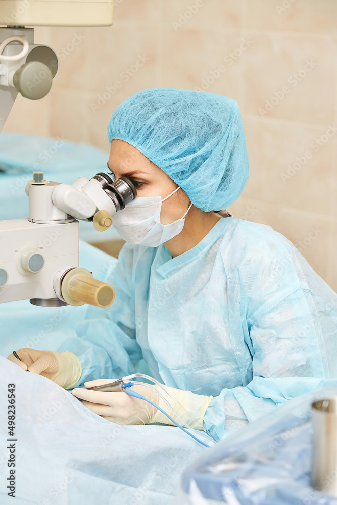 Ophthalmology laser microscope operation. Doctor surgery in clinic ...