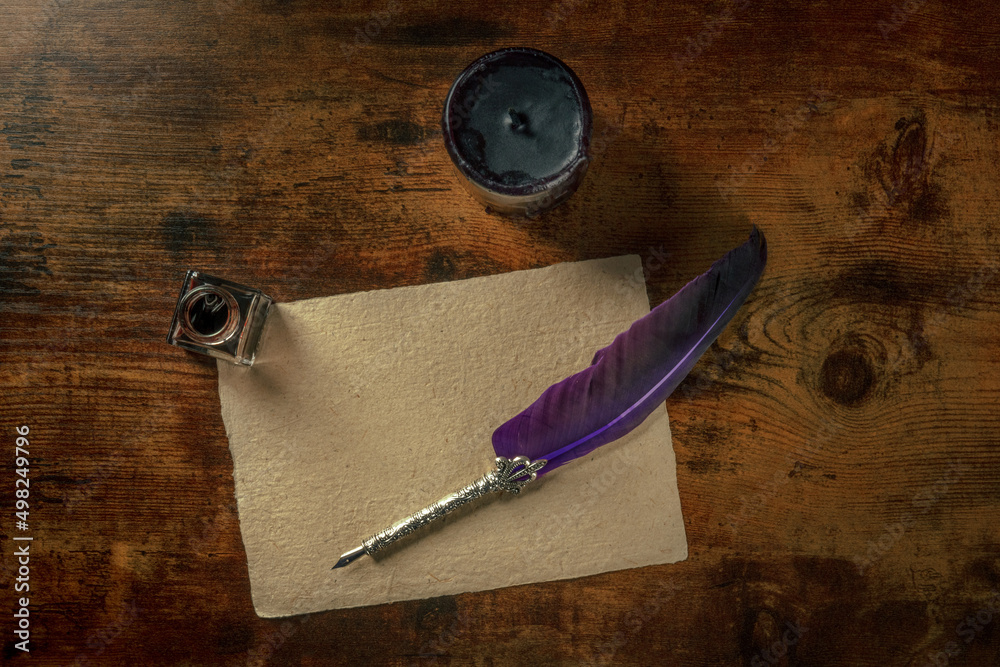 Quill Writing On Paper