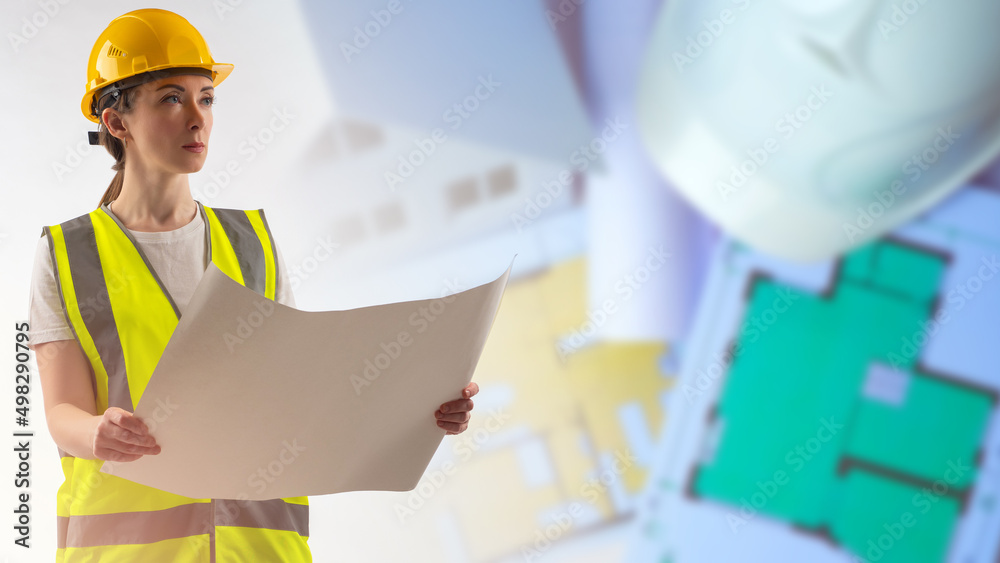 Architect or civil engineer or interior designer. A woman with ...