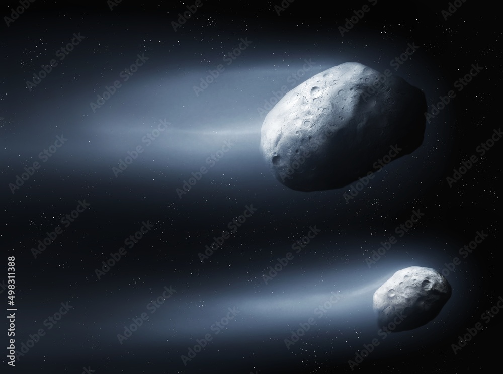 Two comets with bright tails in outer space of the solar system. The ...