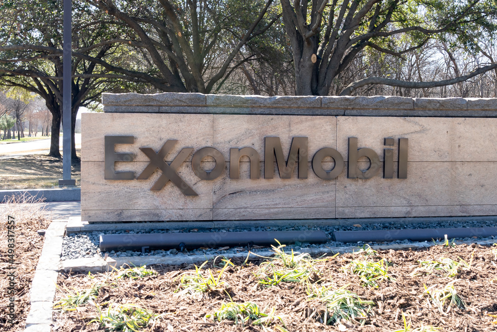 Irving, TX, USA - March 20, 2022: Closeup of ExxonMobil ground sign is ...