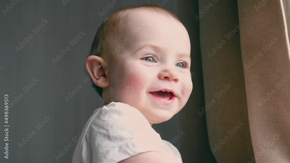 Serious baby face close up. Pensive Baby child in daylight. Emotion of ...