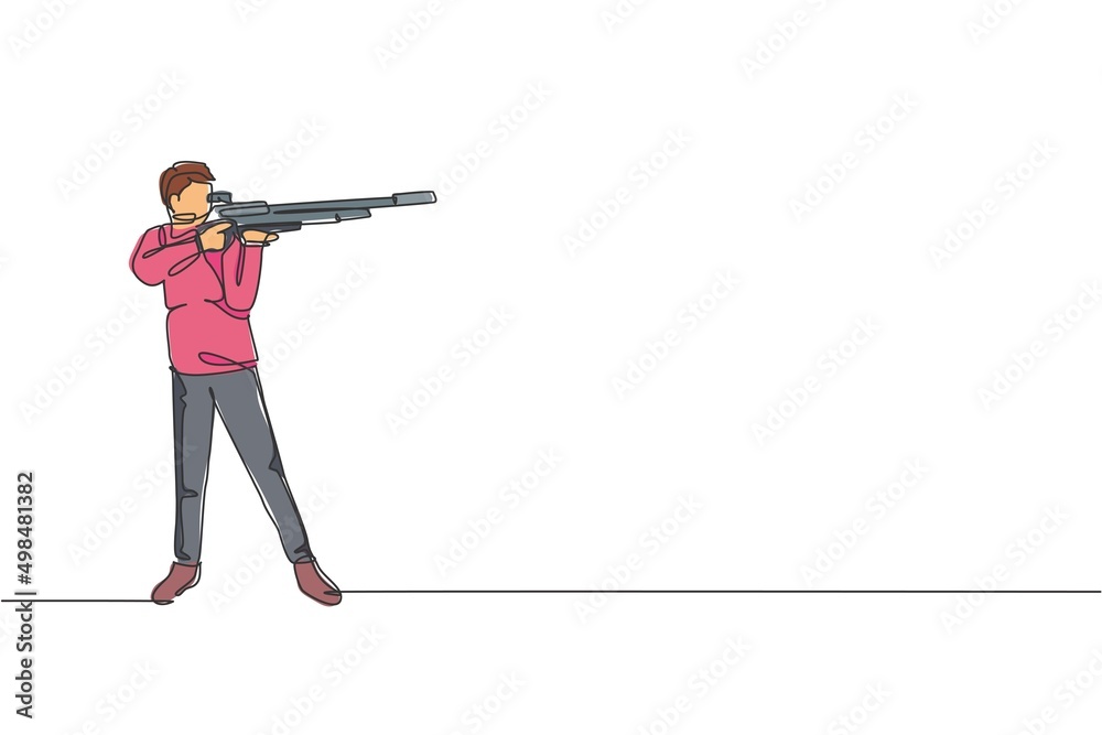 One continuous line drawing of young man on shooting training ground ...