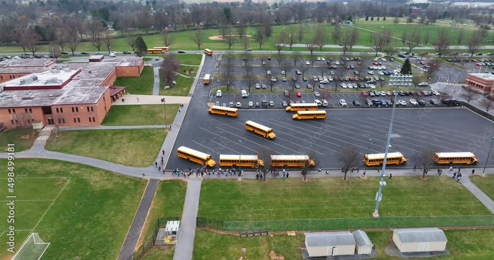 School bus arrival and departure at campus. Students enter school ...