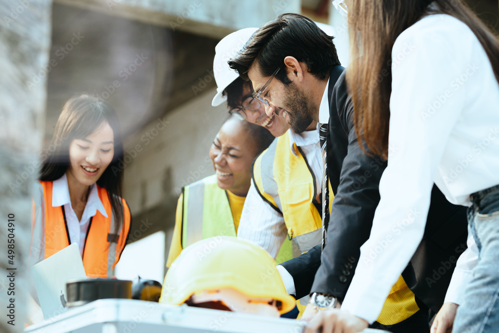 In the Industrial Engineering Facility: Diverse Group of Engineers ...