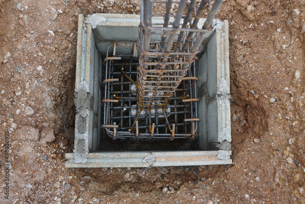 steel reinforced concrete columns and footing in block concrete ...