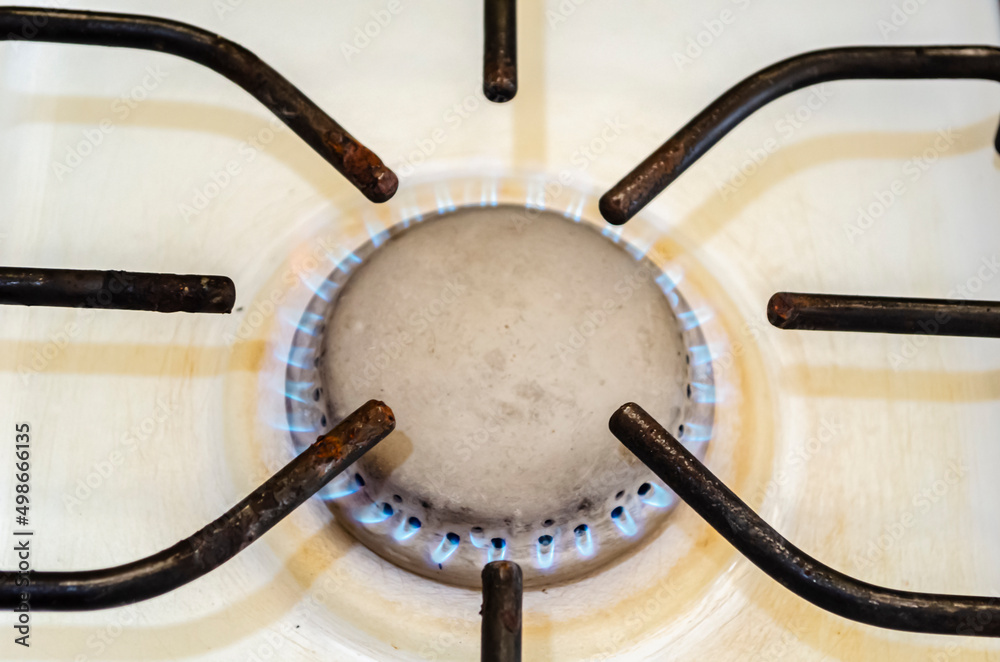 Lit Stove Burner Stock Photo | Adobe Stock