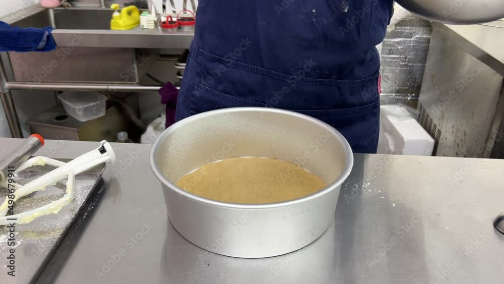 Baking paper placed at the bottom of cake mould, professional pastry ...