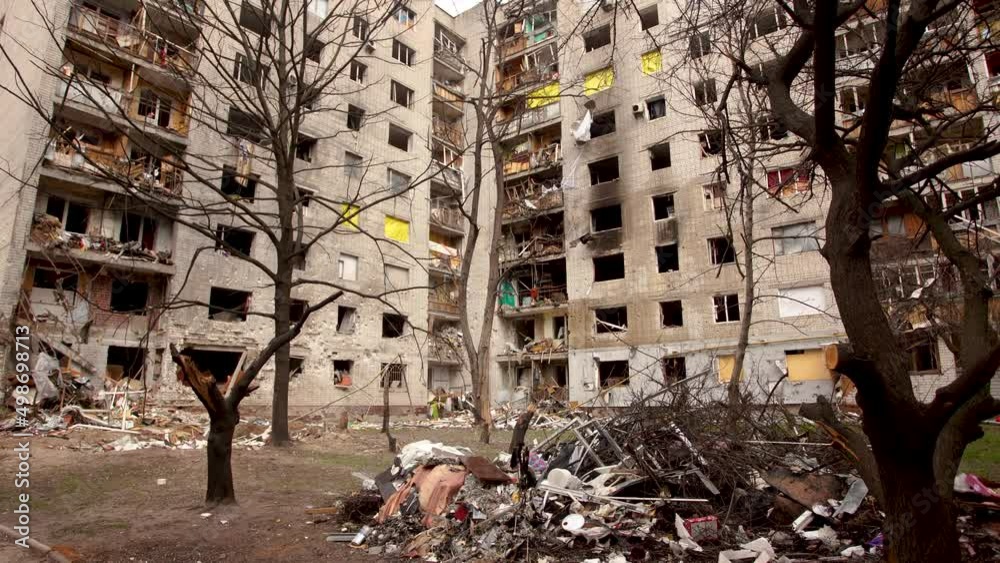 Damaged ruined and burnt out multi-storey house in ukrainian city ...