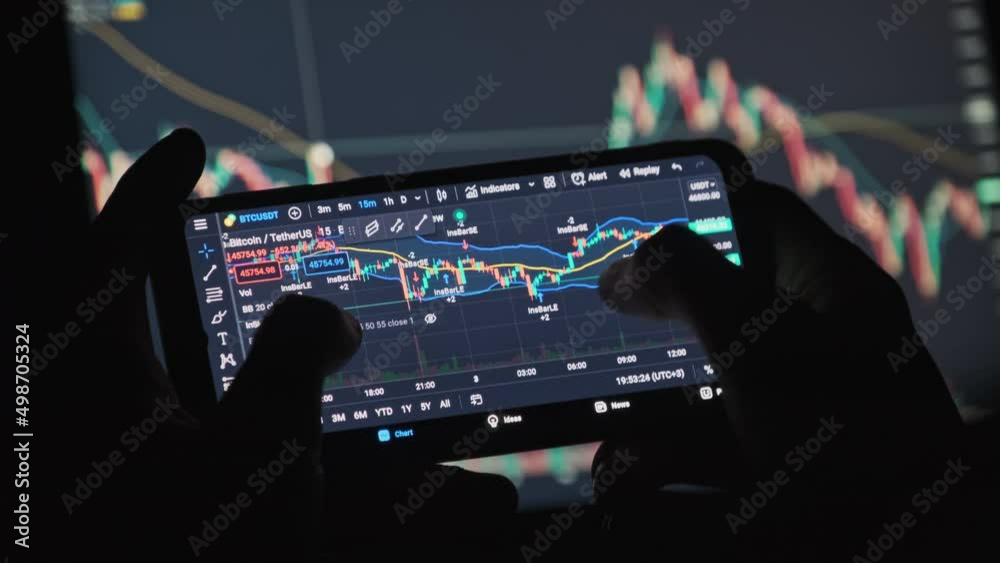 Cryptocurrency chart in smartphone. Trading on digital exchange using ...