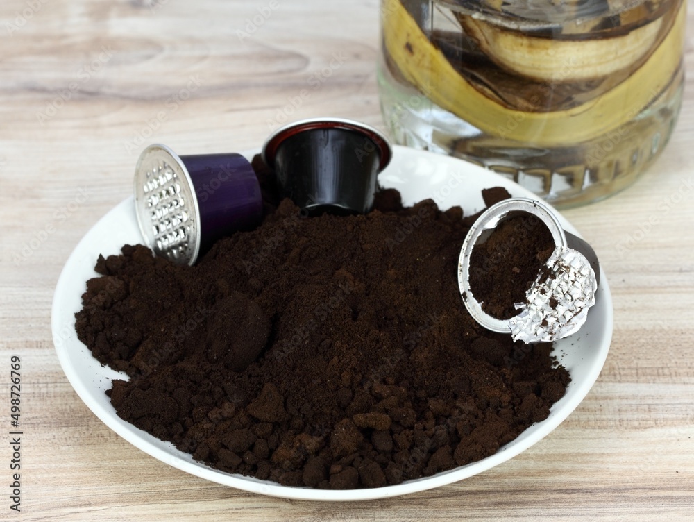 Coffee grounds from espresso coffee capsules and banana peels for ...