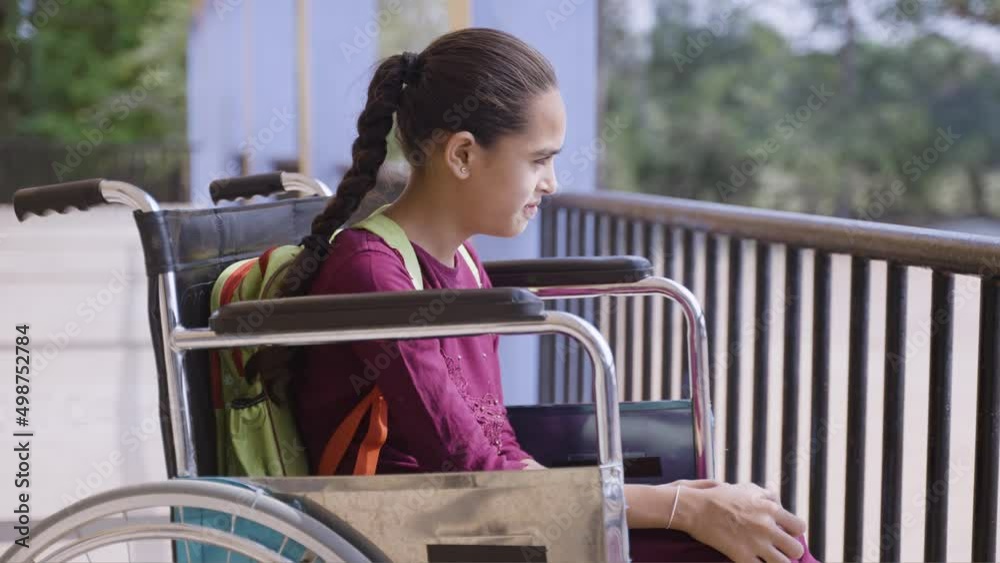 Vídeo do Stock: Sad girl kid with disability thinking sitting on ...