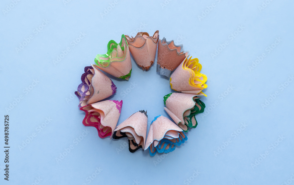 pencil shaving flowers, different colors, in a row on the top of the ...