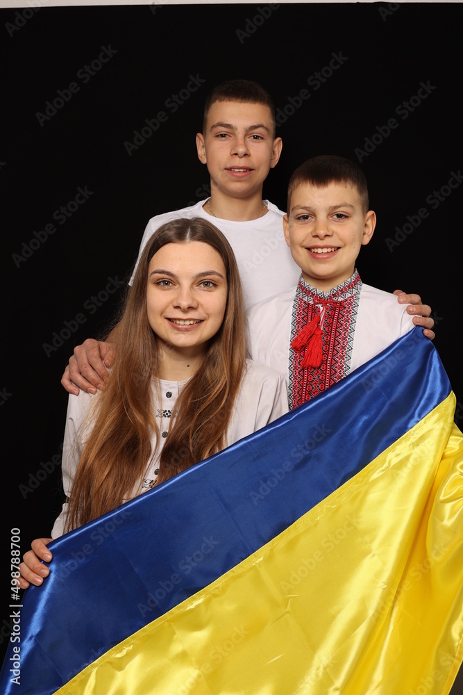 group of people with flag of Ukraine on black background. war in ...