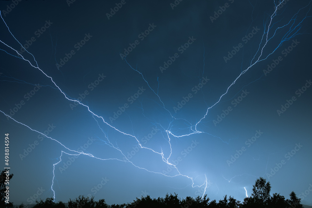 Electrical discharges during a summer storm, branched lightning bolts ...