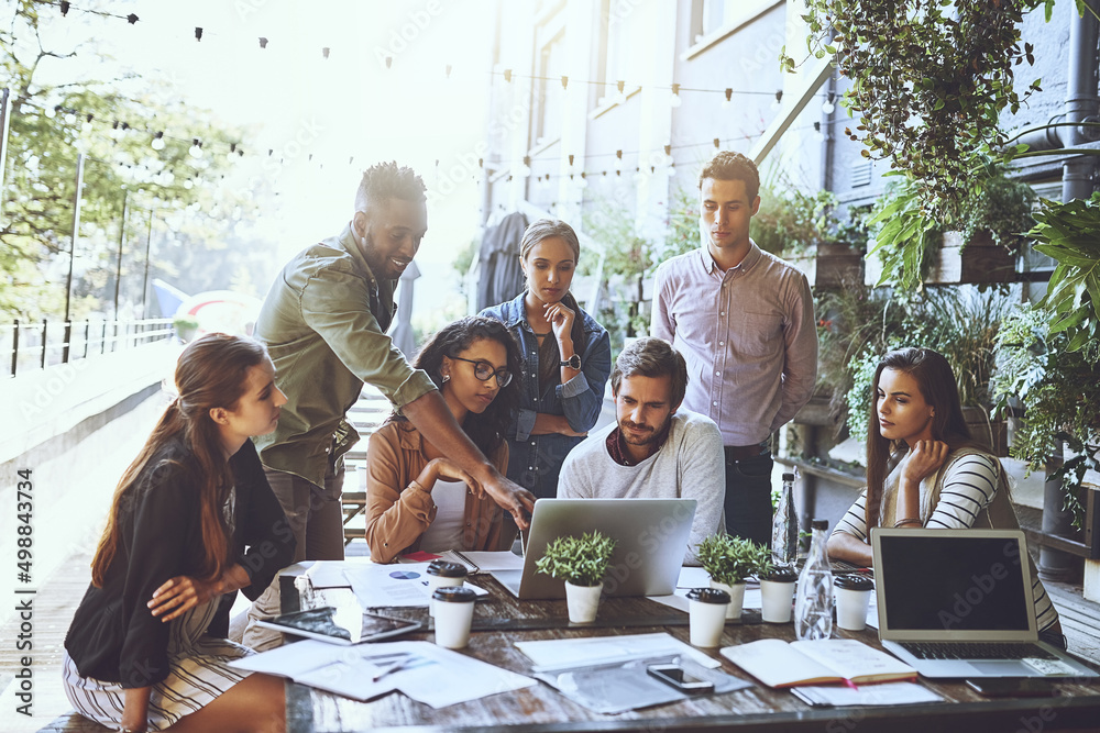 Mixing business with a breath of fresh air. Shot of a team of ...