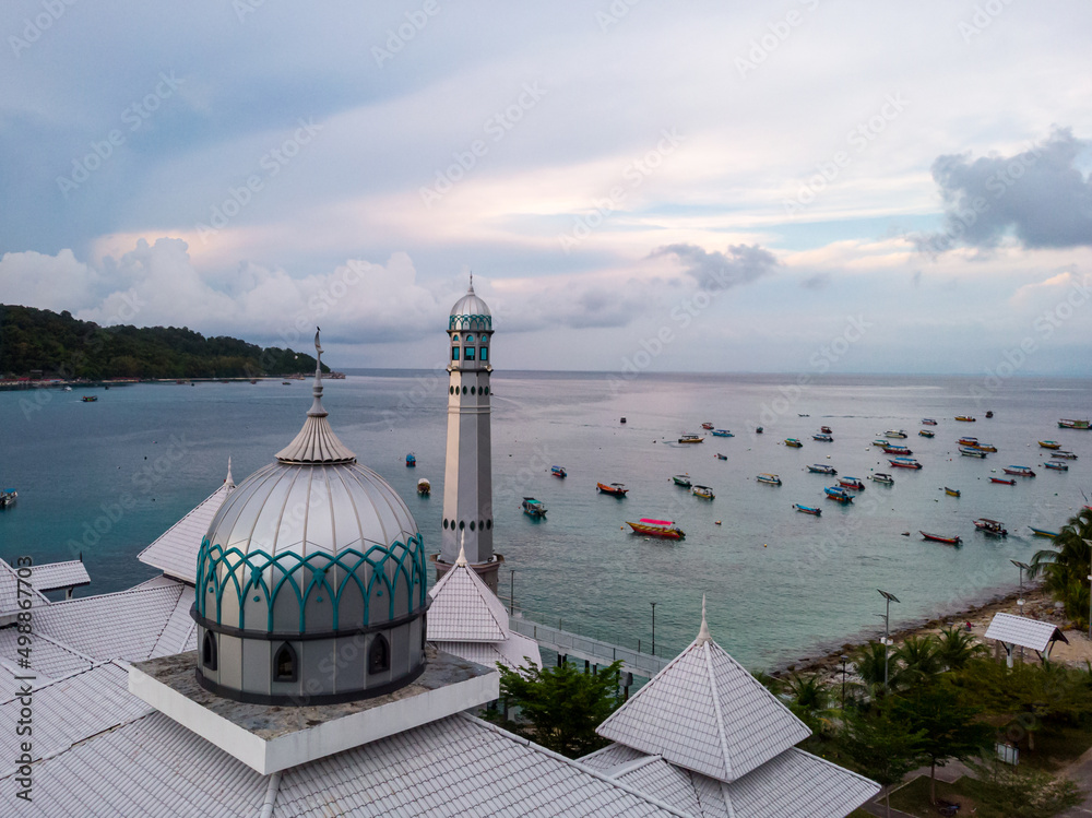 Ar Rahman Mosque at Perhentian Island overlooking the calm ocean during ...