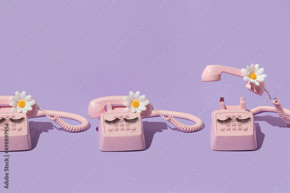 Spring creative pattern with pink retro phone with flower and false ...
