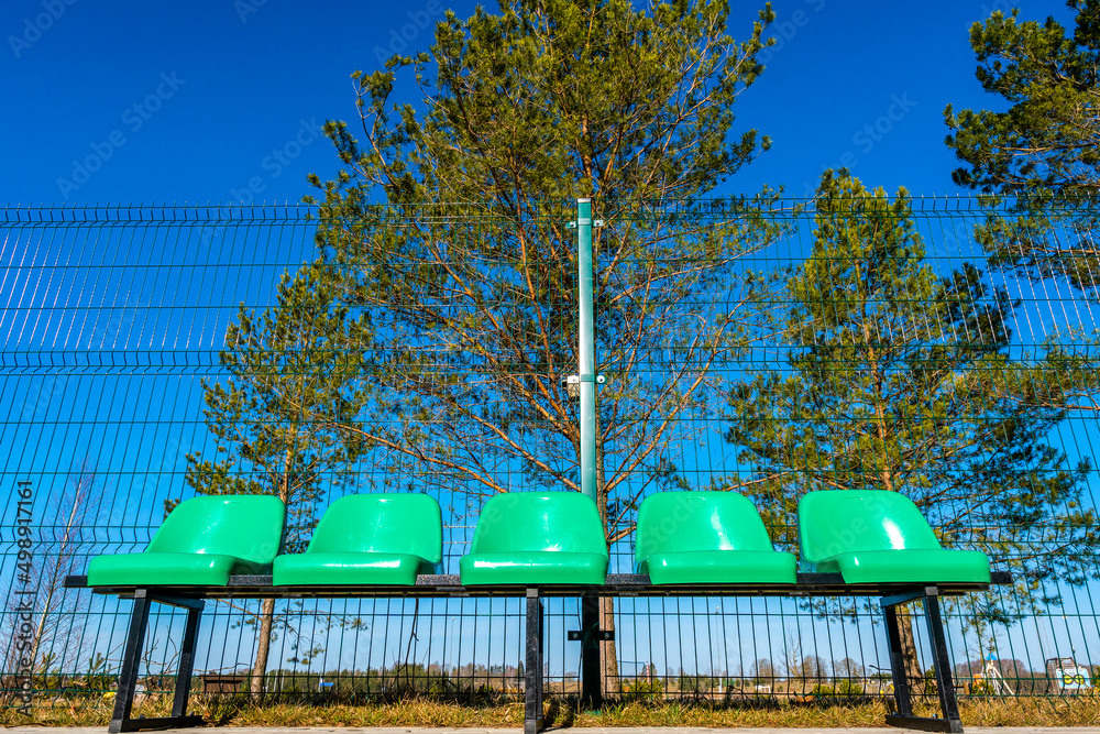 Plastic chairs in the basketball court from a low angle Stock Photo ...