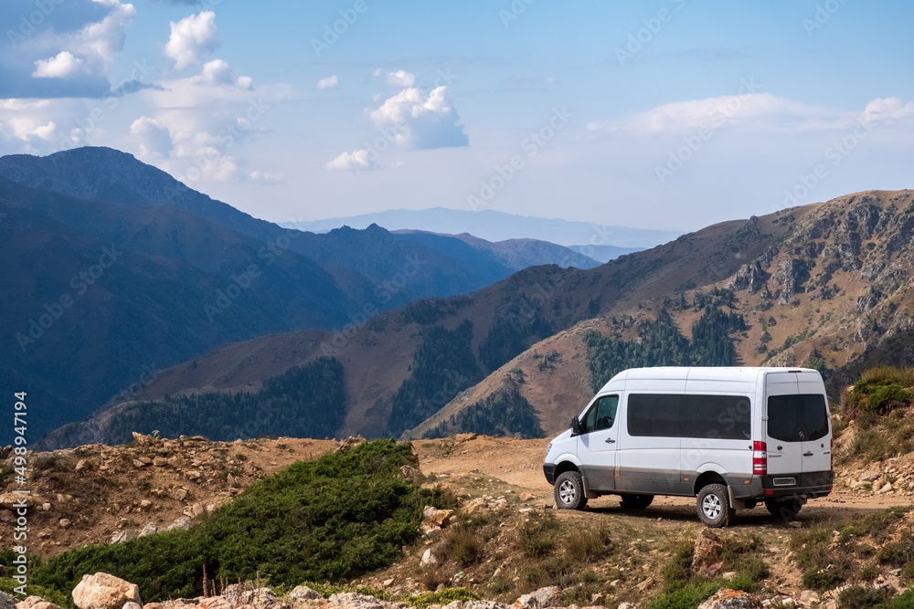 4x4 off-road van Mersedes-benz sprinter with beautiful mountains ...